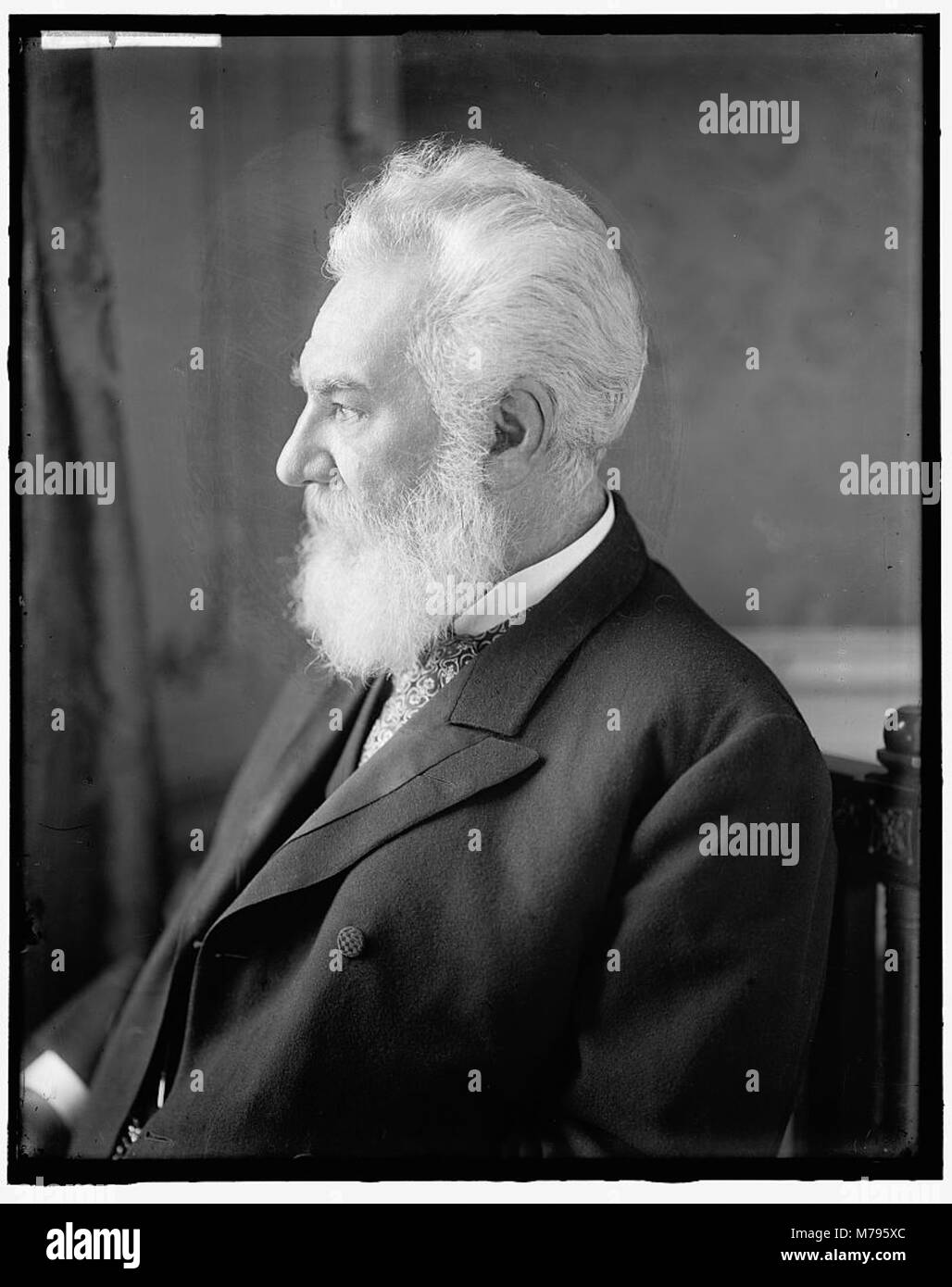 This photograph features Alexander Graham Bell, the Scottish inventor ...