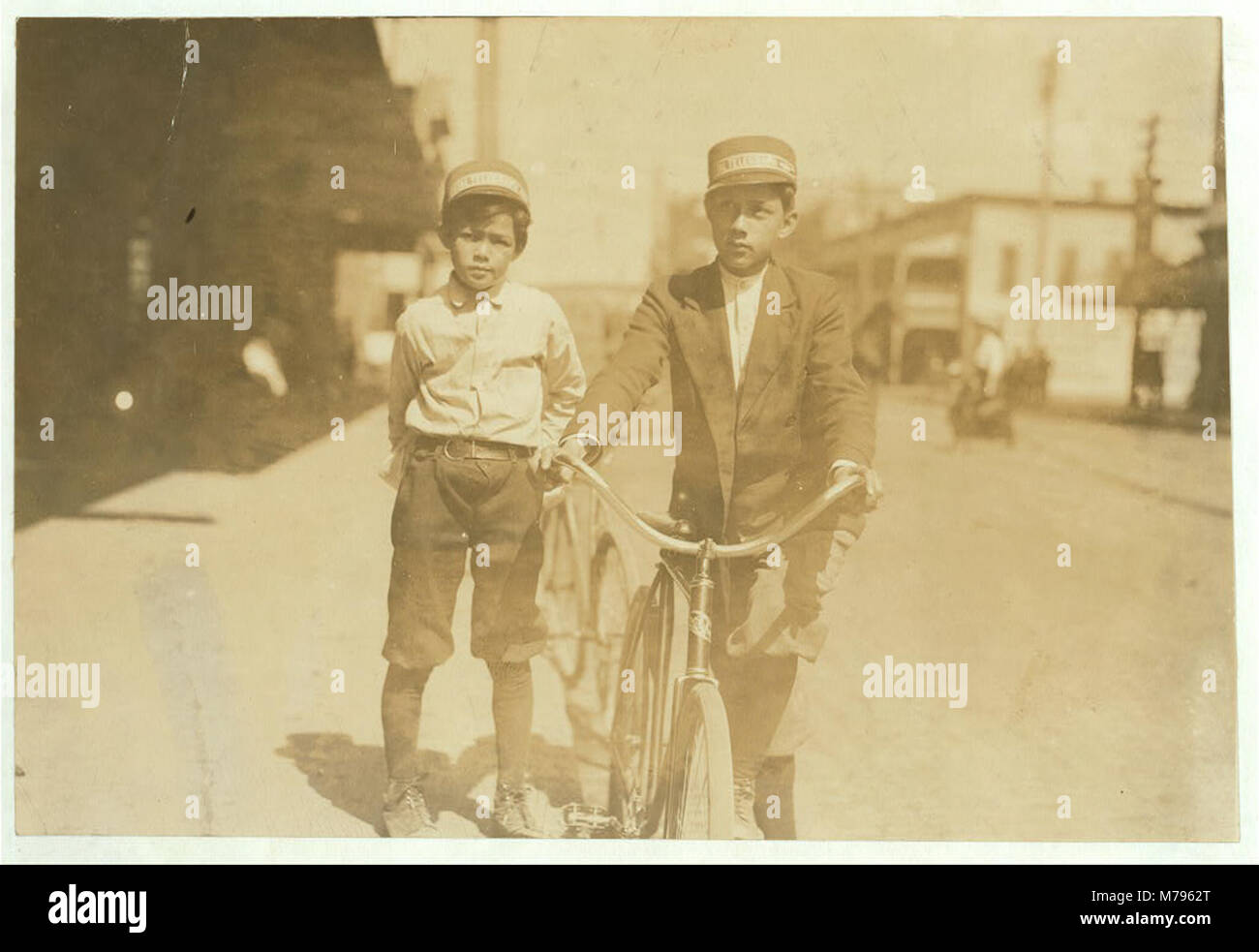 This photograph shows Ben Key and his younger brother Tom. Tom helps ...