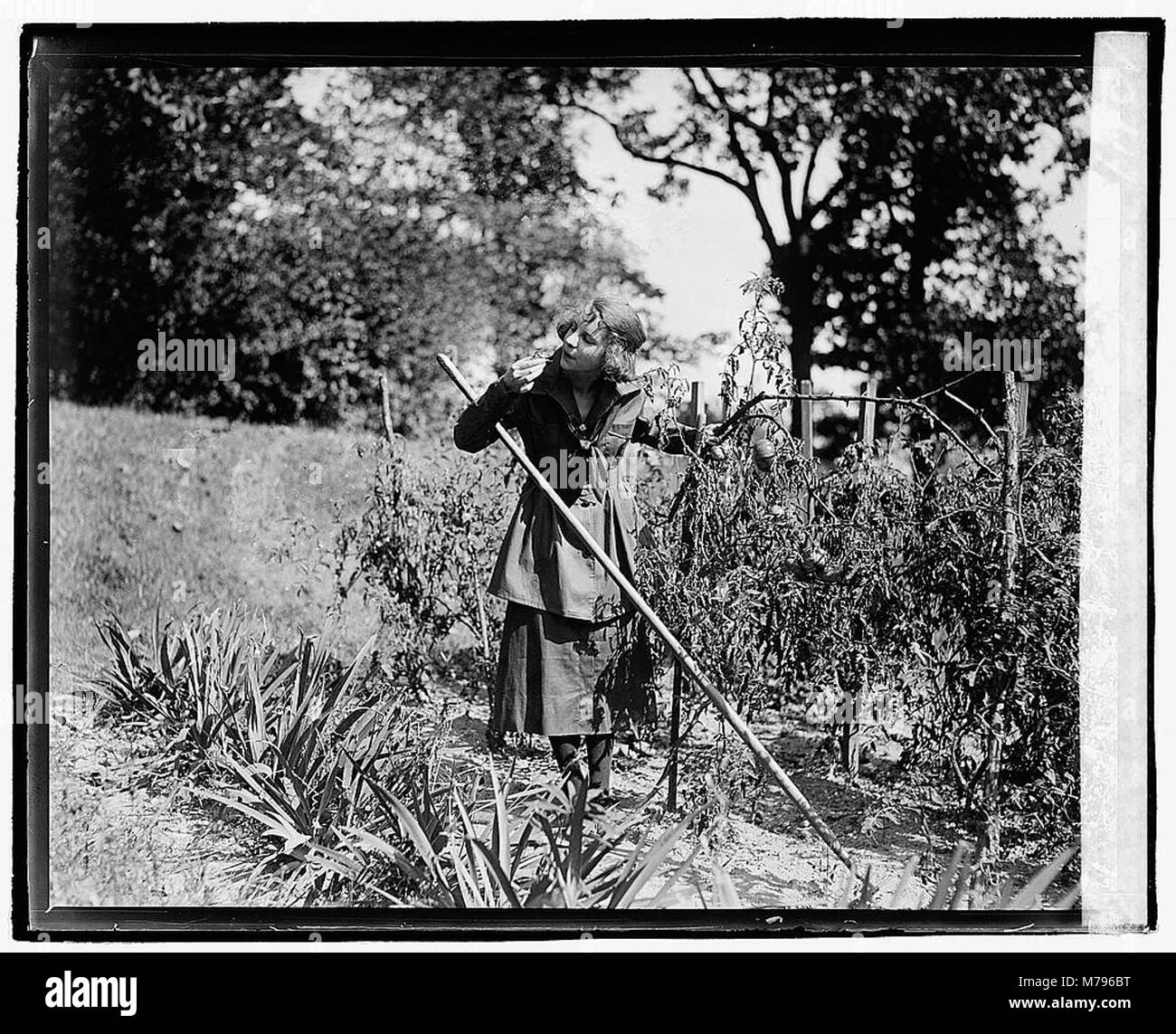 A portrait of Betty Baker, a notable figure captured in a formal ...
