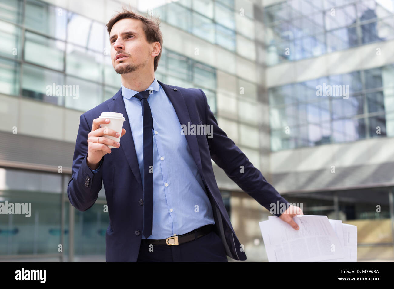 Portrait of busy man in suit rushing to important meeting Stock Photo ...