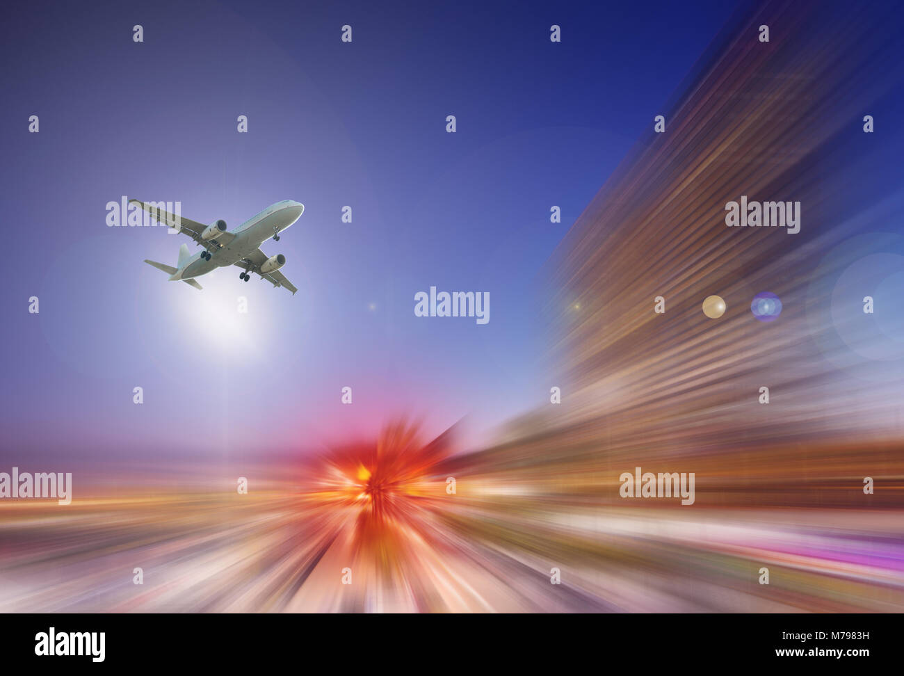 Big airplane taking up motion in sky on landscape blurred background ...