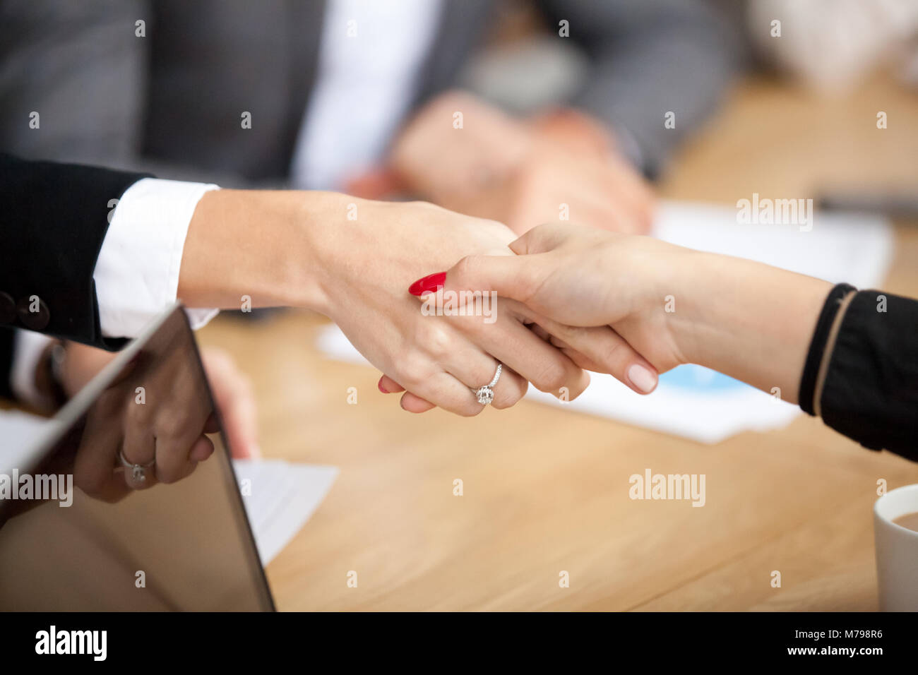 Businesswomen handshaking at group meeting, female hands shaking Stock ...