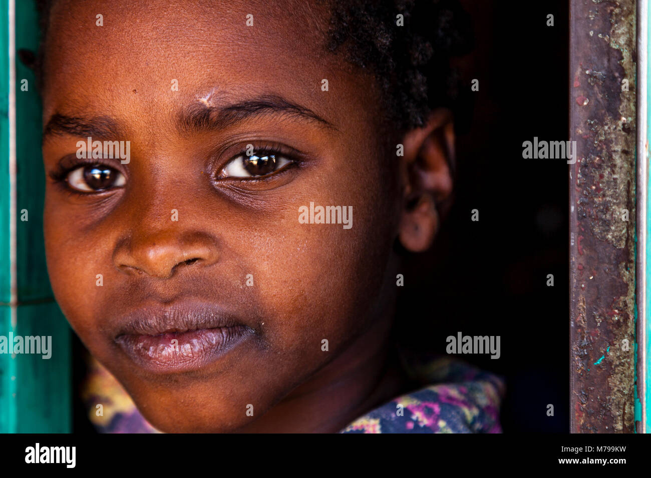 Portrait Of A Young Hamar Girl Outside A Shop In The Town Of Dimeka ...