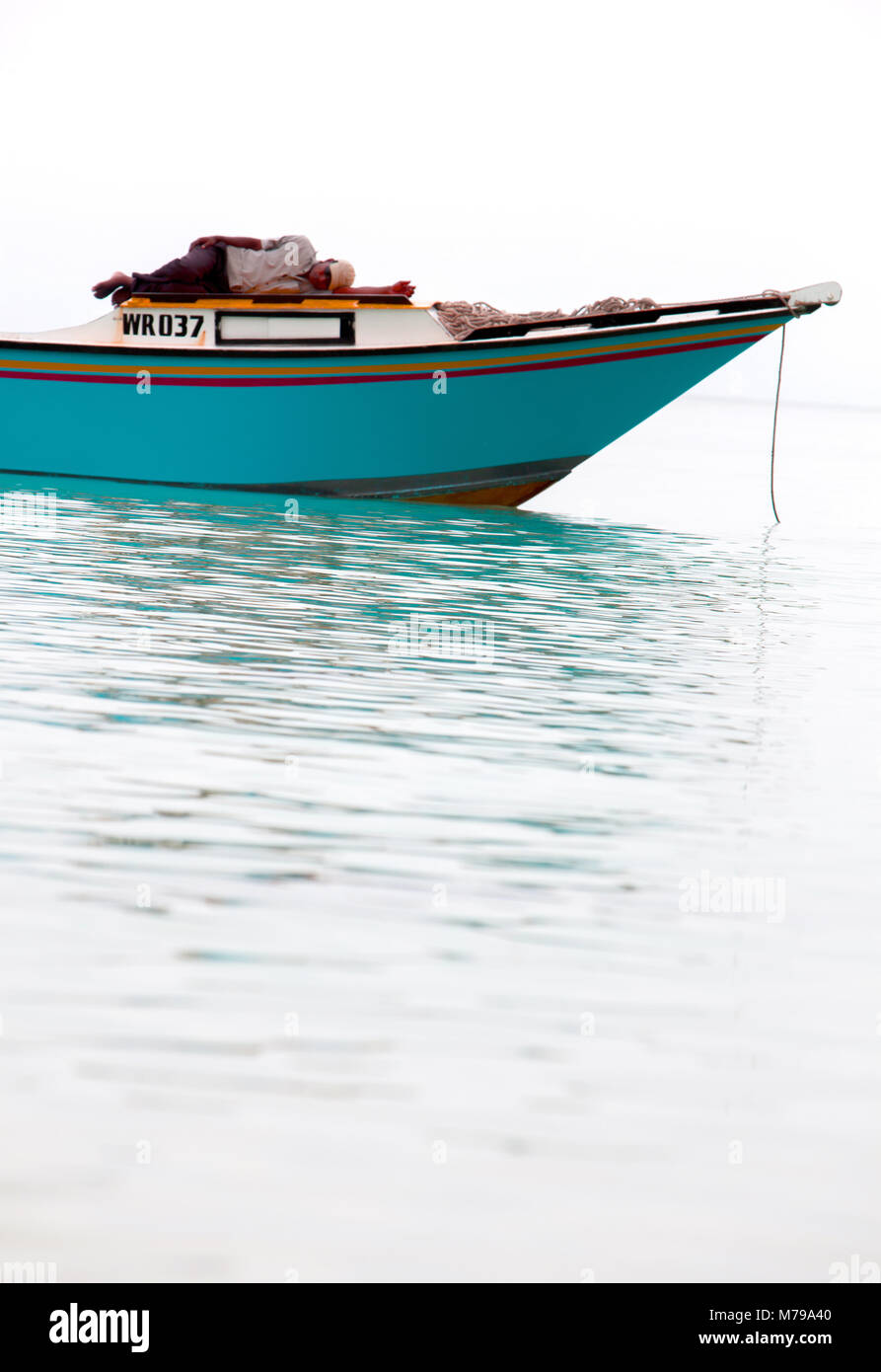 Calm ocean with a fishing boat hi-res stock photography and images - Alamy