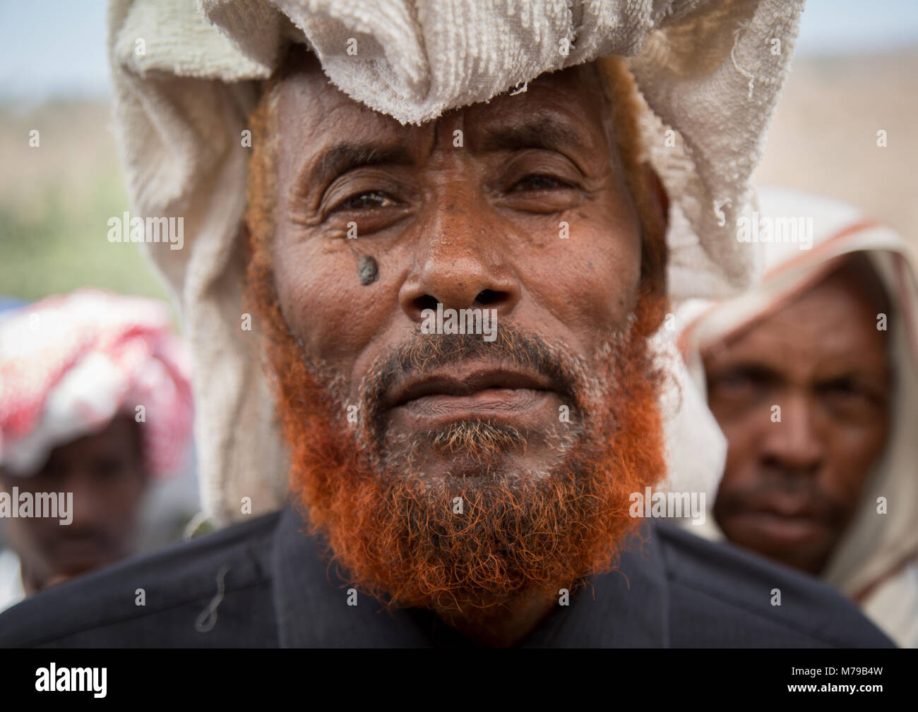 Portrait of muslim man with henna tinted beard in sambate market, Oromo ...