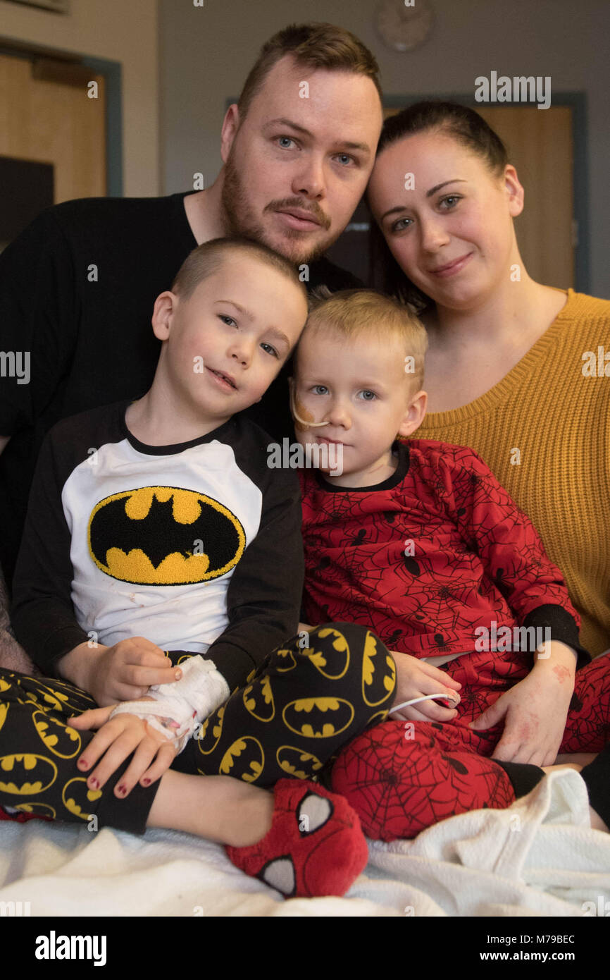Fiona and Lee Cripps with their sons, four-year-old Ollie (right) and ...