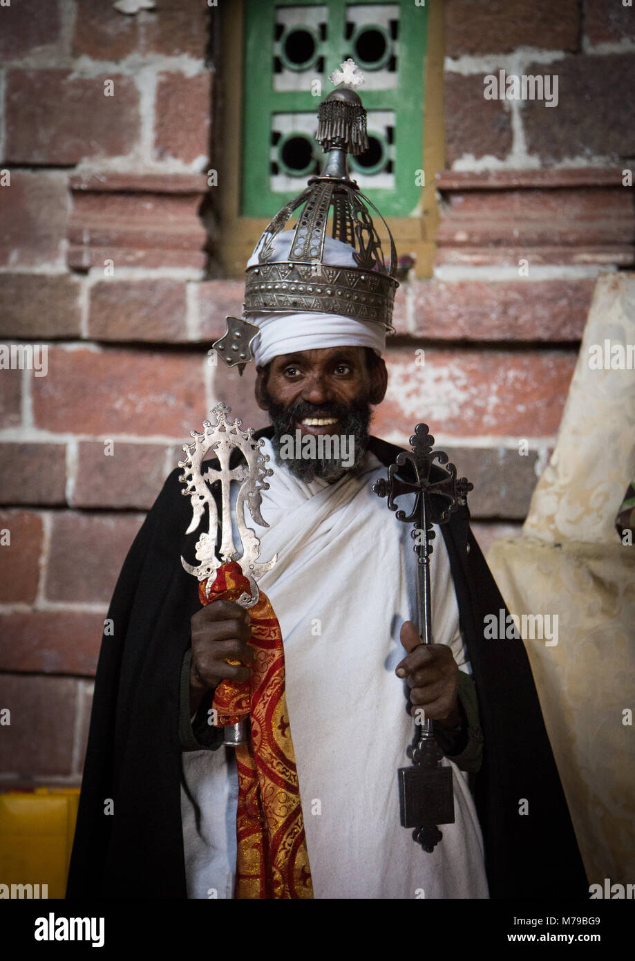 Portrait of an ethiopian orthodox priest holding a cross in nakuto lab ...