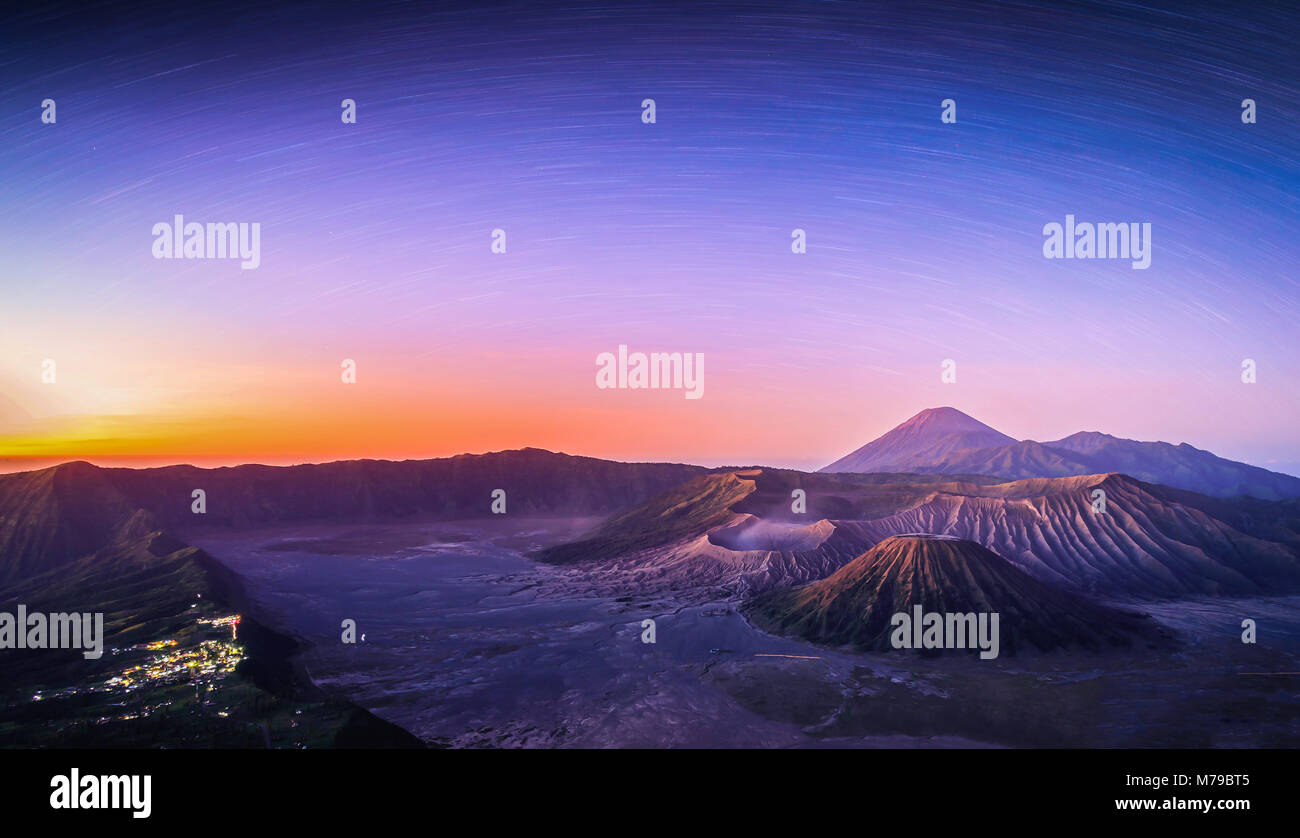 Mount Bromo volcano (Gunung Bromo) at sunrise with star trail in Bromo ...