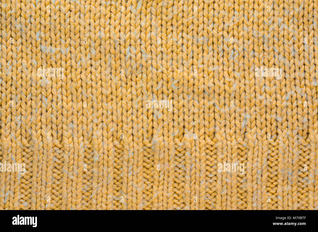 Texture of a Orange Color Knitted Sweater with Two Types of Knitting ...