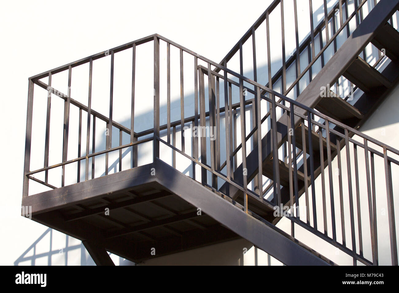 Metal structure of a metal staircase outside a multistory building ...
