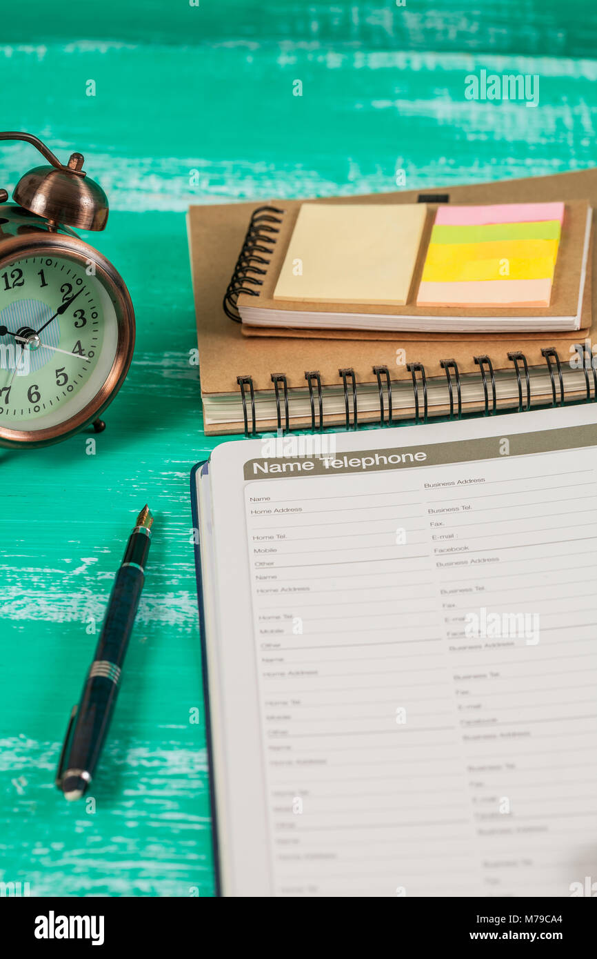 number telephone list on page of diary book planner with color tone ...