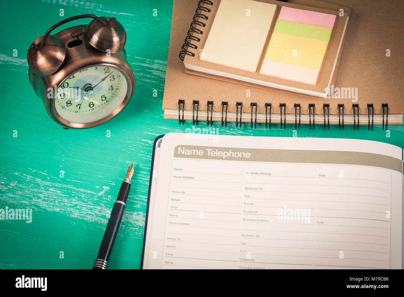 number telephone list on page of diary book planner with color tone ...