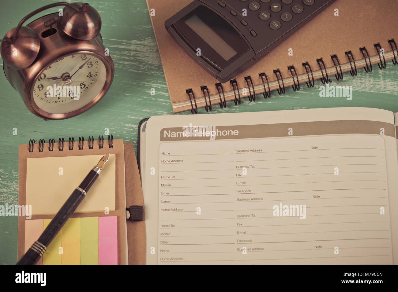 number telephone list on page of diary book planner with color tone ...