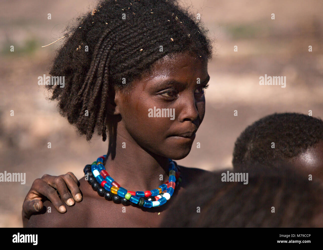 Portrait of an afar tribe girl with a beaded necklace, Afar region ...