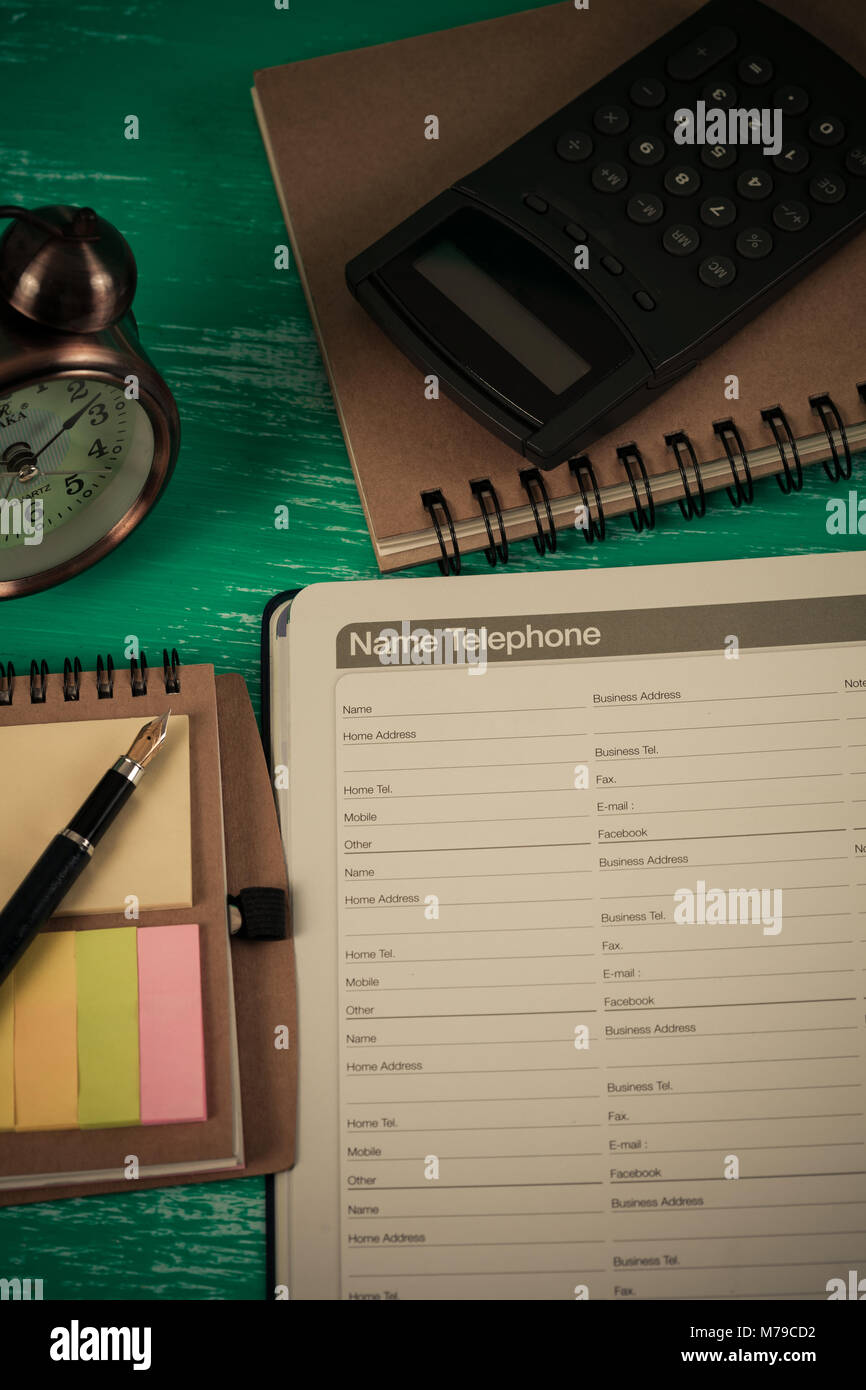 number telephone list on page of diary book planner with color tone ...