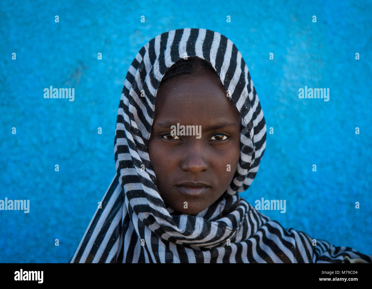 Portrait of an afar tribe girl with a veil, Afar region, Semera ...