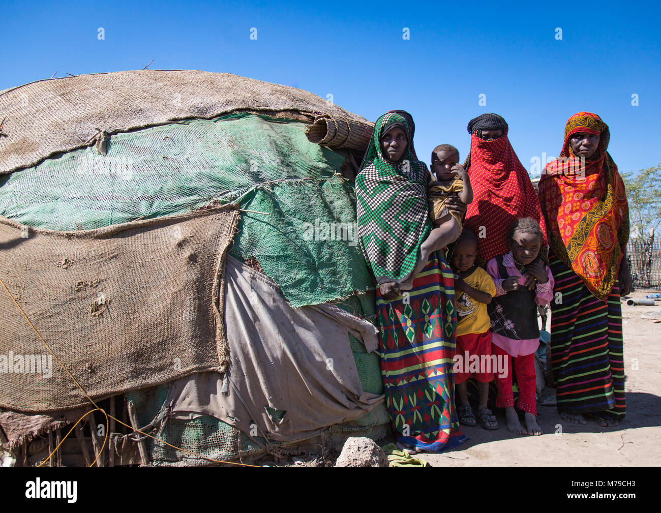 Several generations of afar tribe women in front of their hut, Afar ...