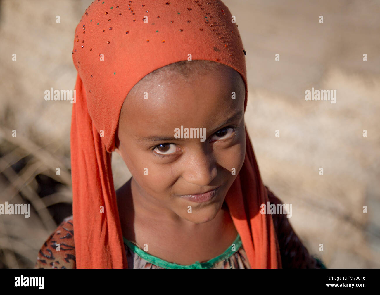 Portrait of an afar tribe girl in front of her hut, Afar region, Afambo ...