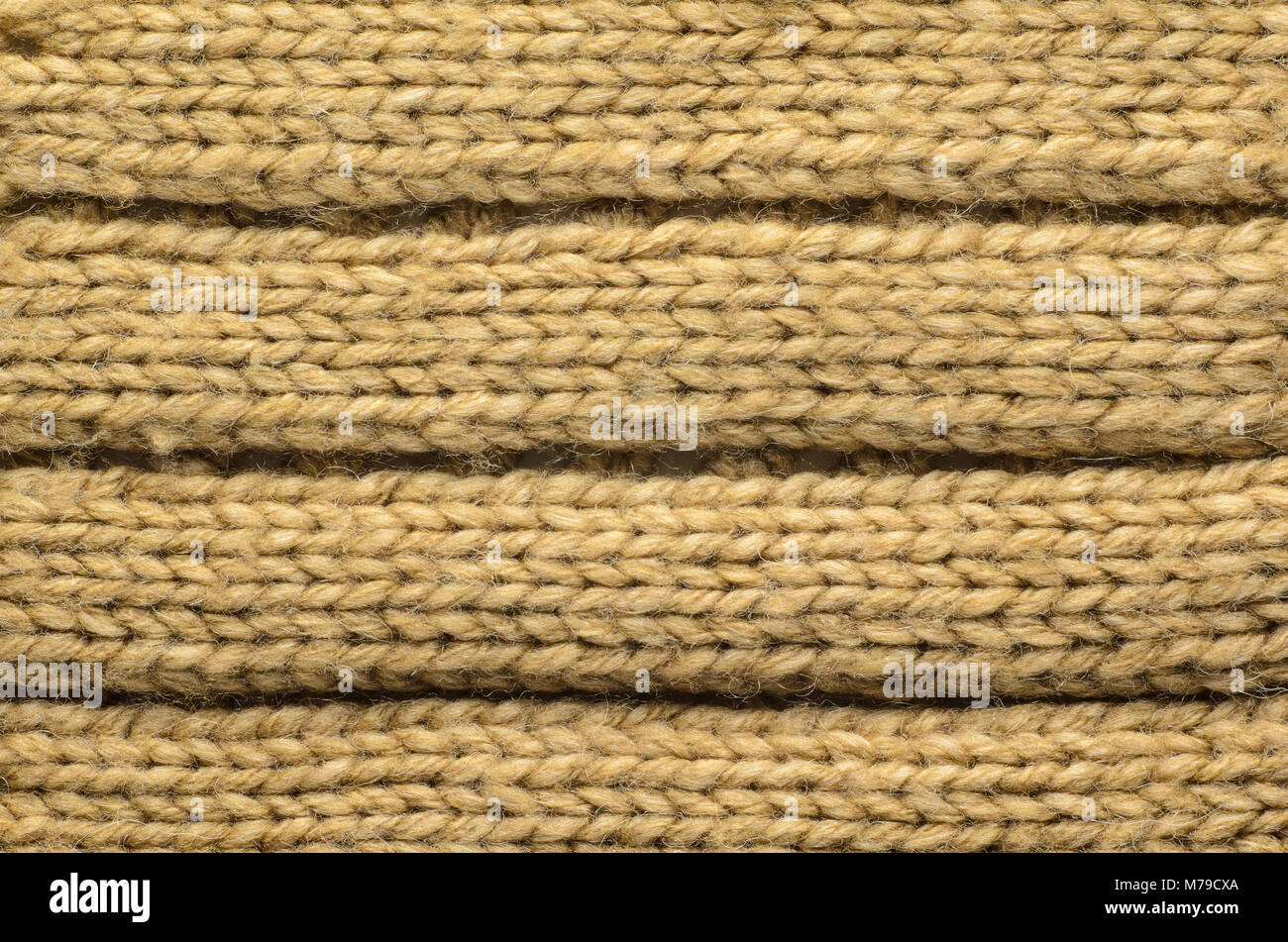 Knit texture of wool knitted fabric with regular pattern as background ...