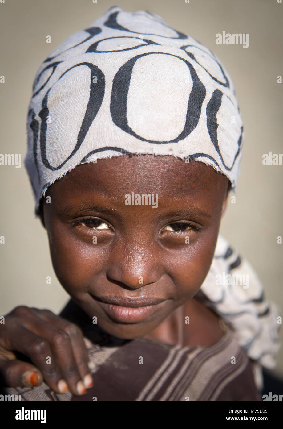 Portrait of an afar tribe girl with a veil, Afar region, Assayta ...