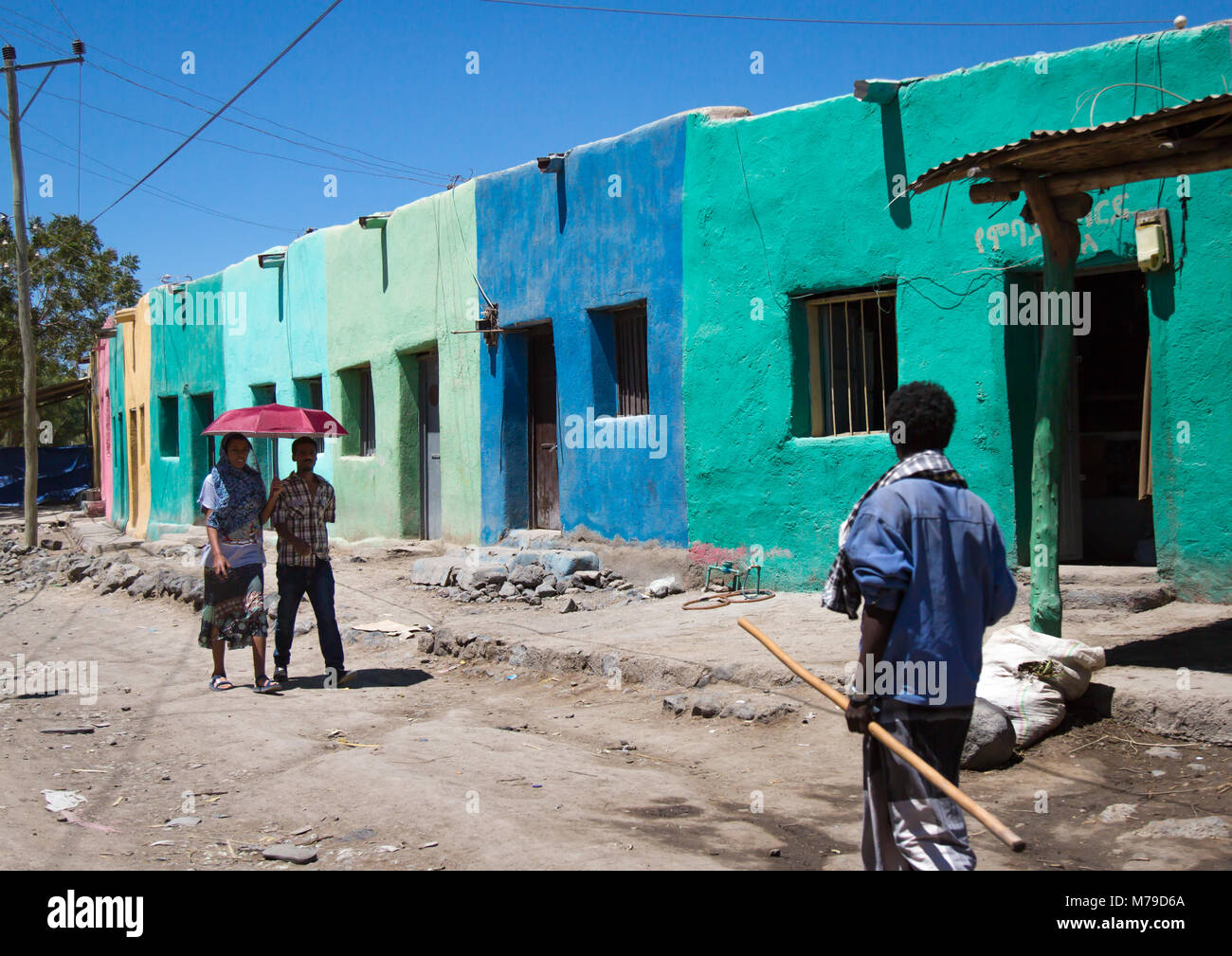 Street of assayta with bright and colorful houses under the sun, Afar ...