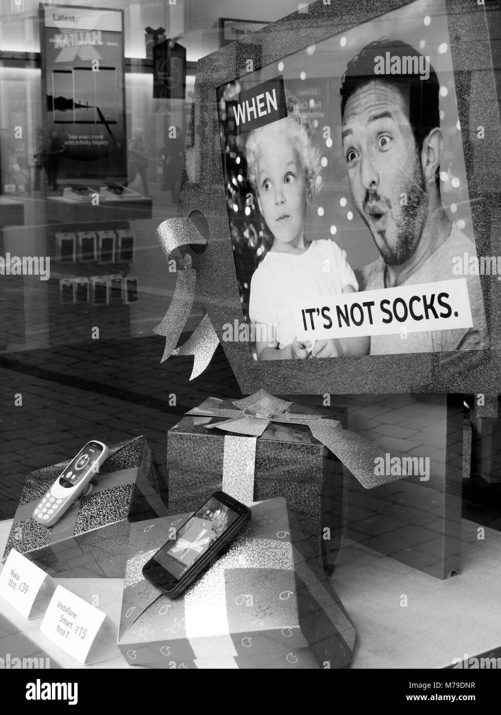 Christmas happy man phone Black and White Stock Photos & Images - Alamy