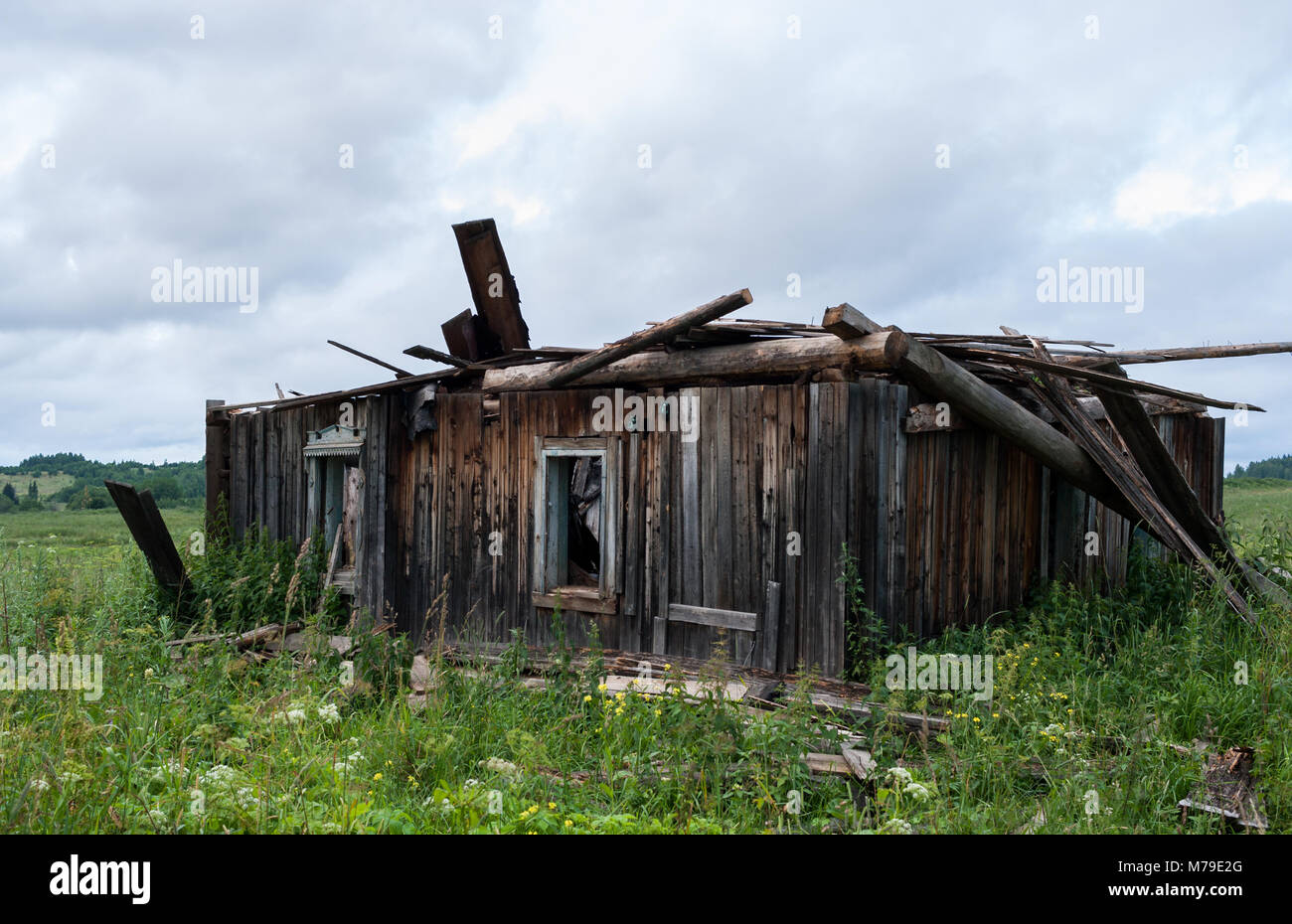Close-up an old ruined wooden house Stock Photo - Alamy