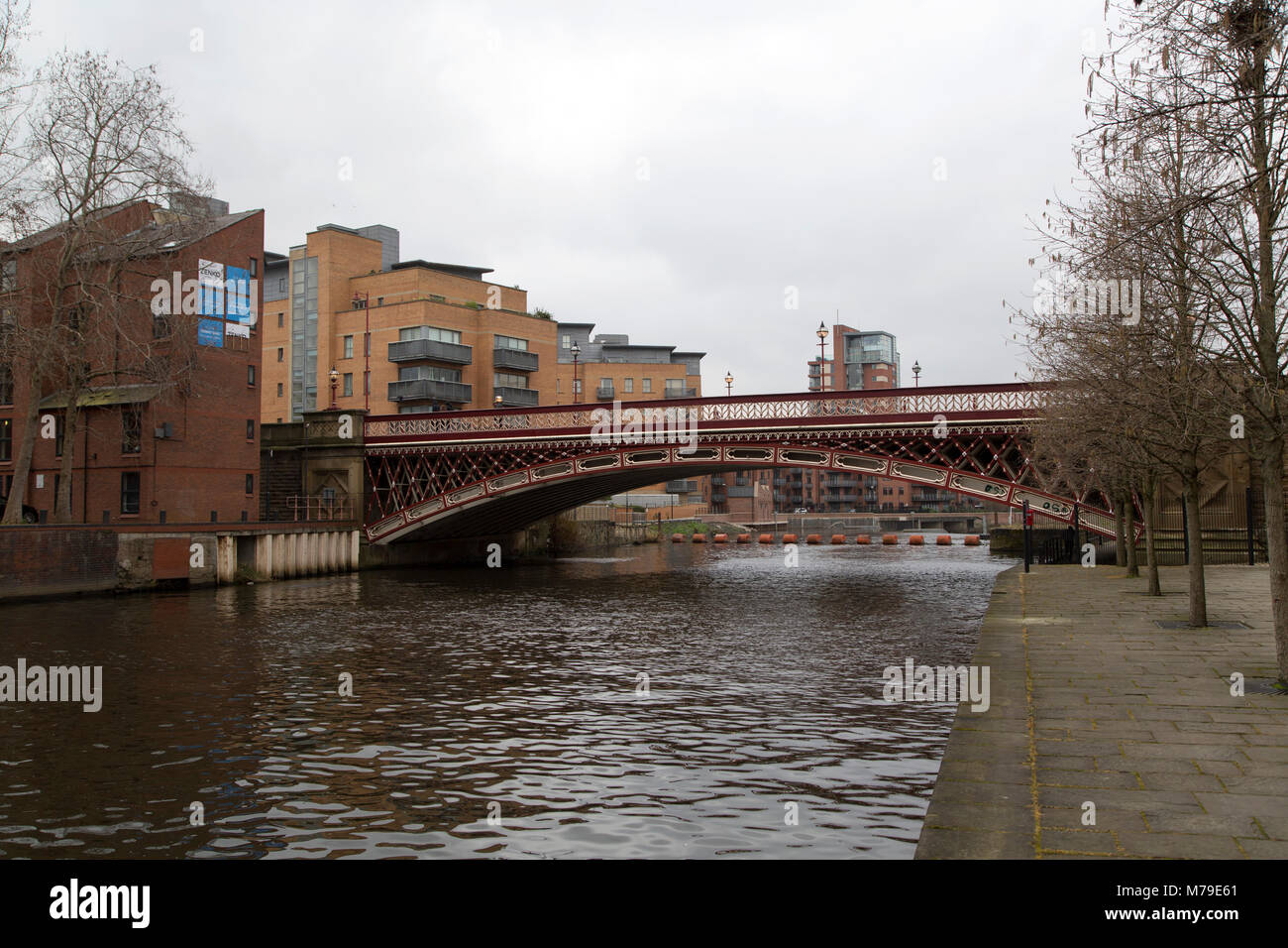 The River Aire at Clence Dock in Leeds, UK. Mills stand by the waterway ...