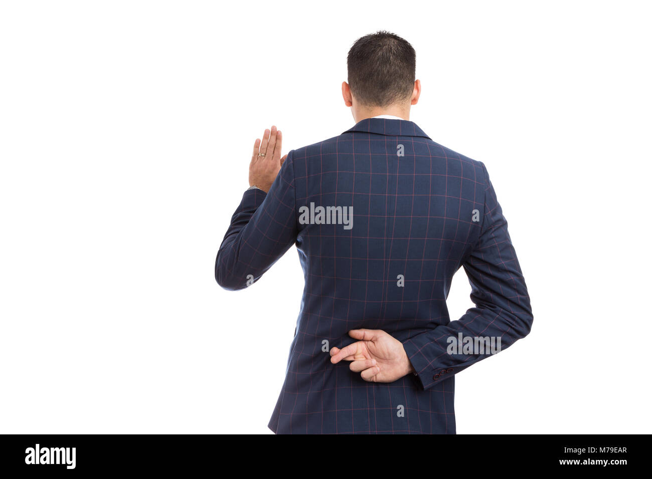 Fake oath vow gesture with fingers crossed behind back made by lawyer ...