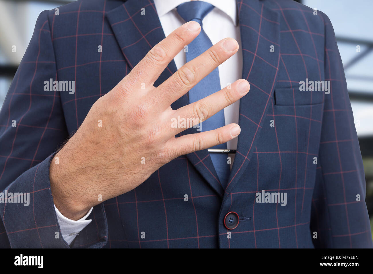 Realtor hand showing number four as successful fourth sale rent or buy ...