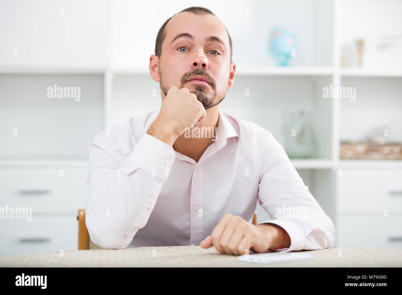 Confused businessman reading documents hi-res stock photography and ...