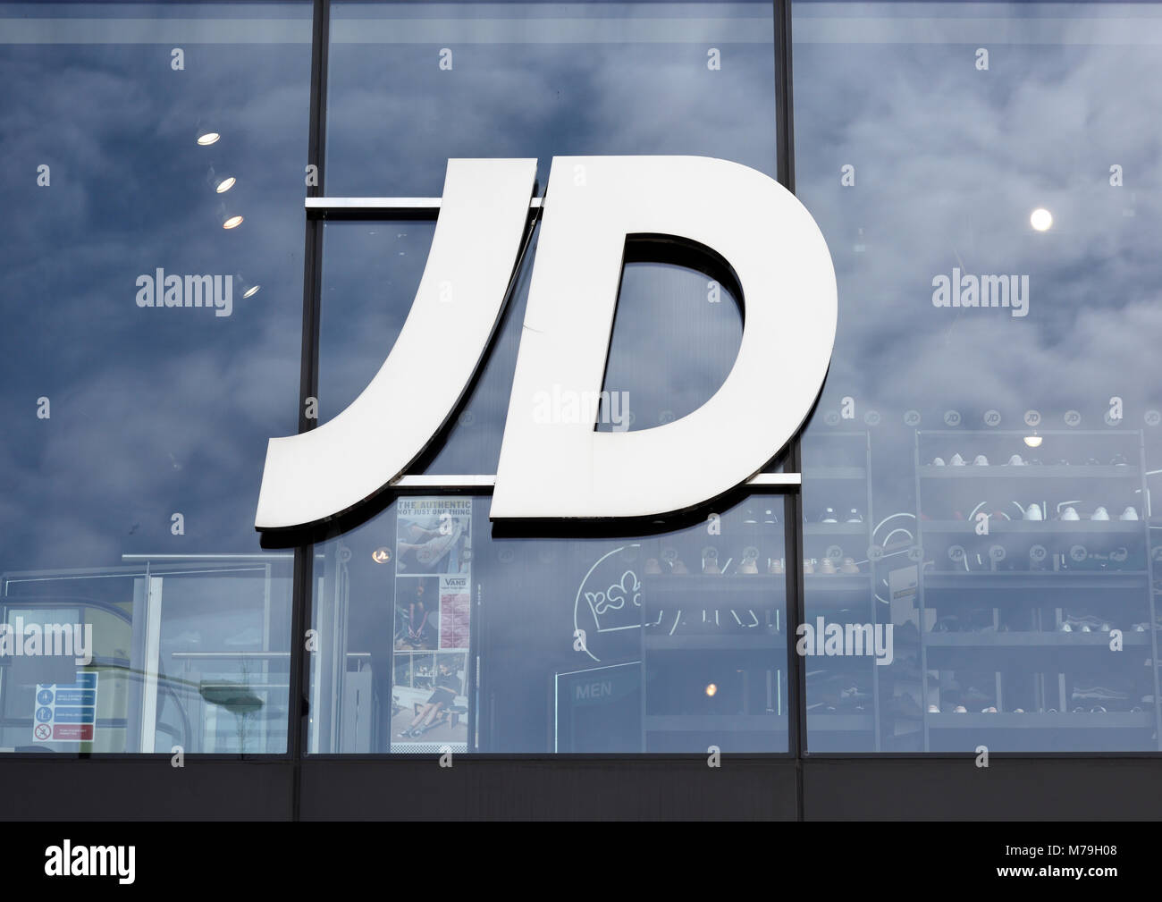 JD sports logo on glass store front, shop facade in bury toen centre ...