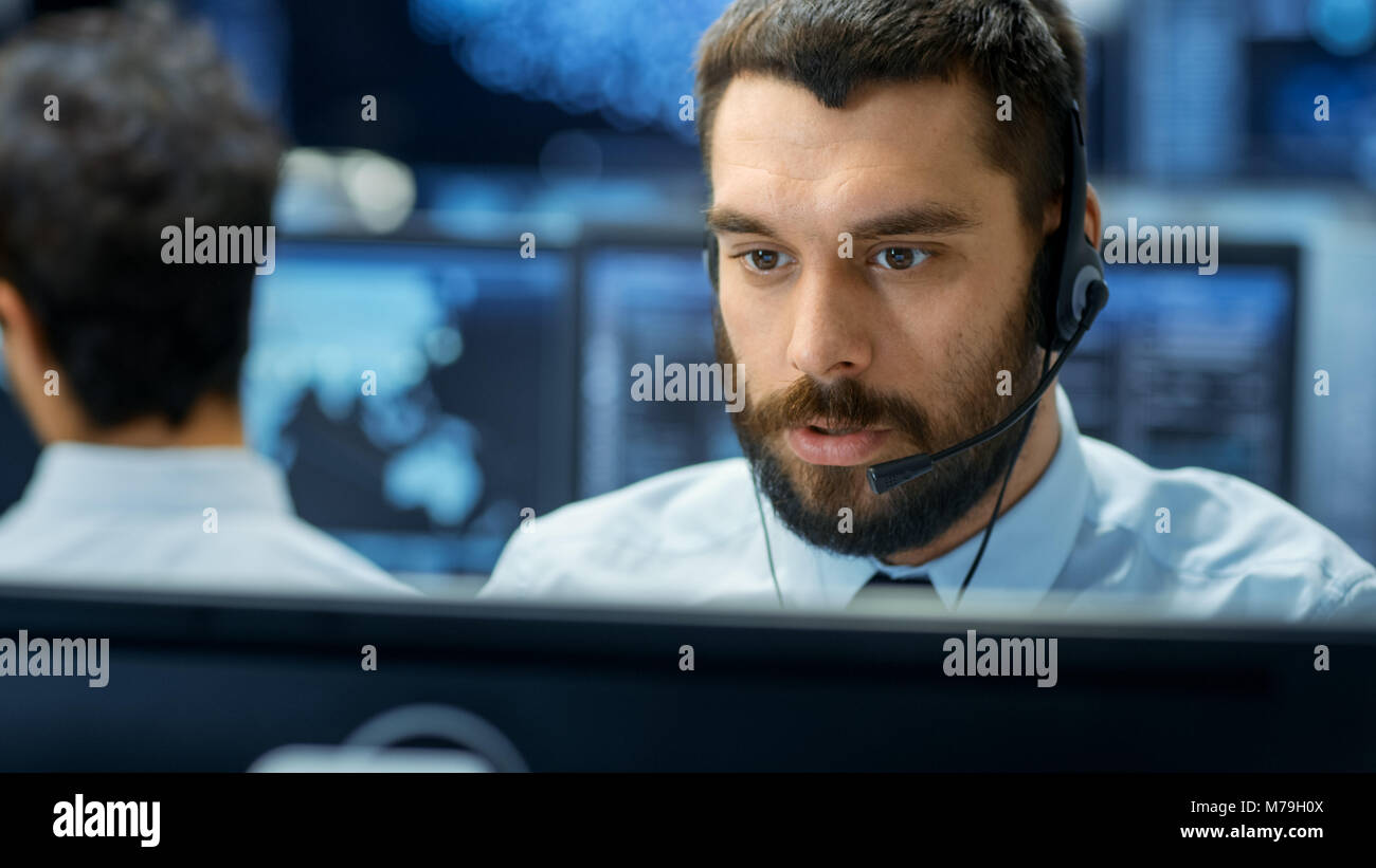 Customer Service Representative Answer Client's Questions in a Headset ...