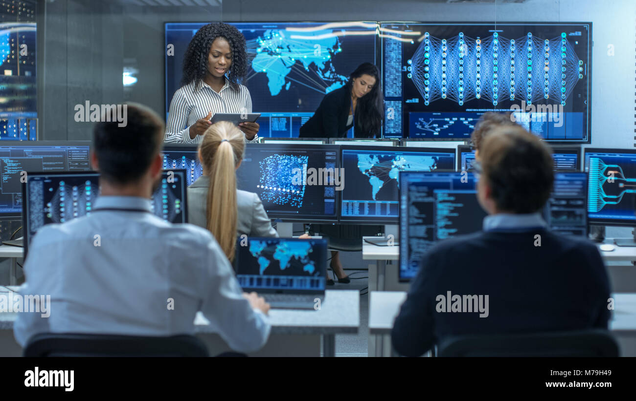 Chief Project Engineer Consults Tablet Computer and Holds Briefing for ...
