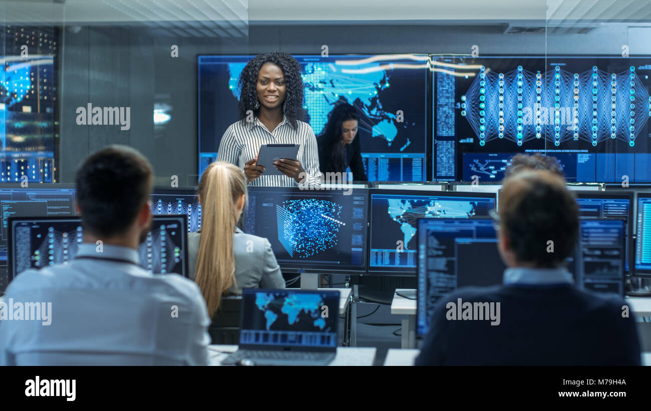 Chief Project Engineer Consults Tablet Computer and Holds Briefing for ...