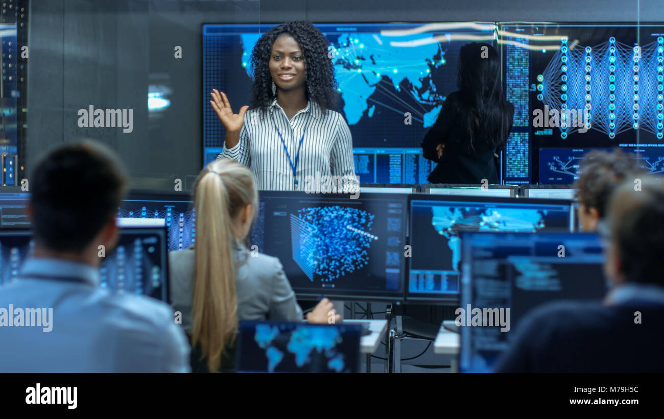 Chief Project Engineer Holds Briefing for a Team of Scientists that are ...