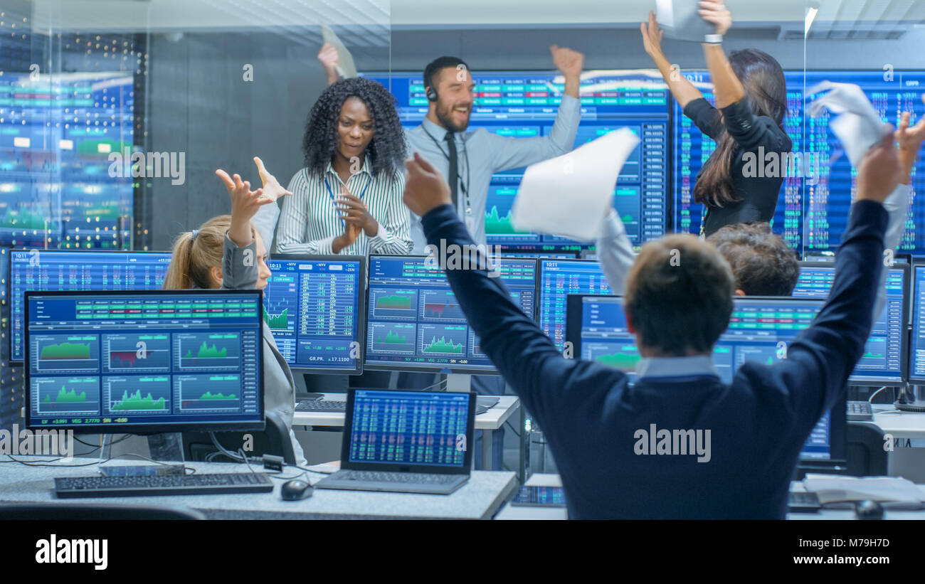 Multi-Ethnic Team of Traders Have Successful Day at the Stock Exchange ...
