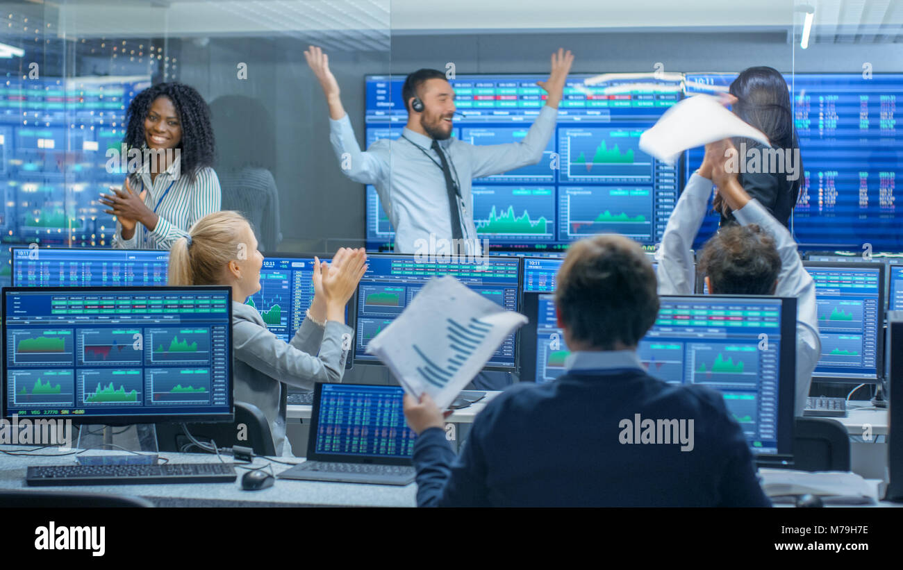 Multi-Ethnic Team of Traders Have Successful Day at the Stock Exchange ...