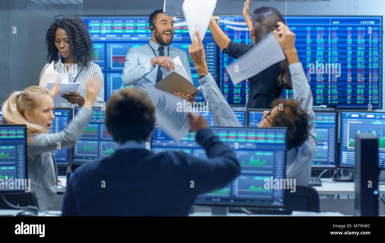 Multi-Ethnic Team of Traders Have Successful Day at the Stock Exchange ...