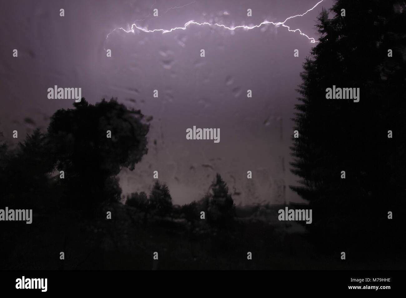 Thunderstorm, look out of a window Stock Photo - Alamy