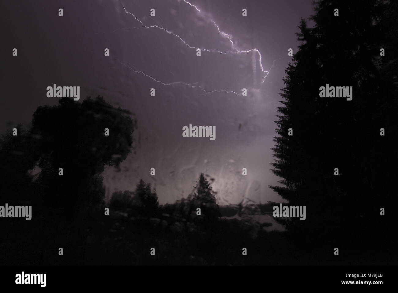 Thunderstorm, look out of a window Stock Photo - Alamy