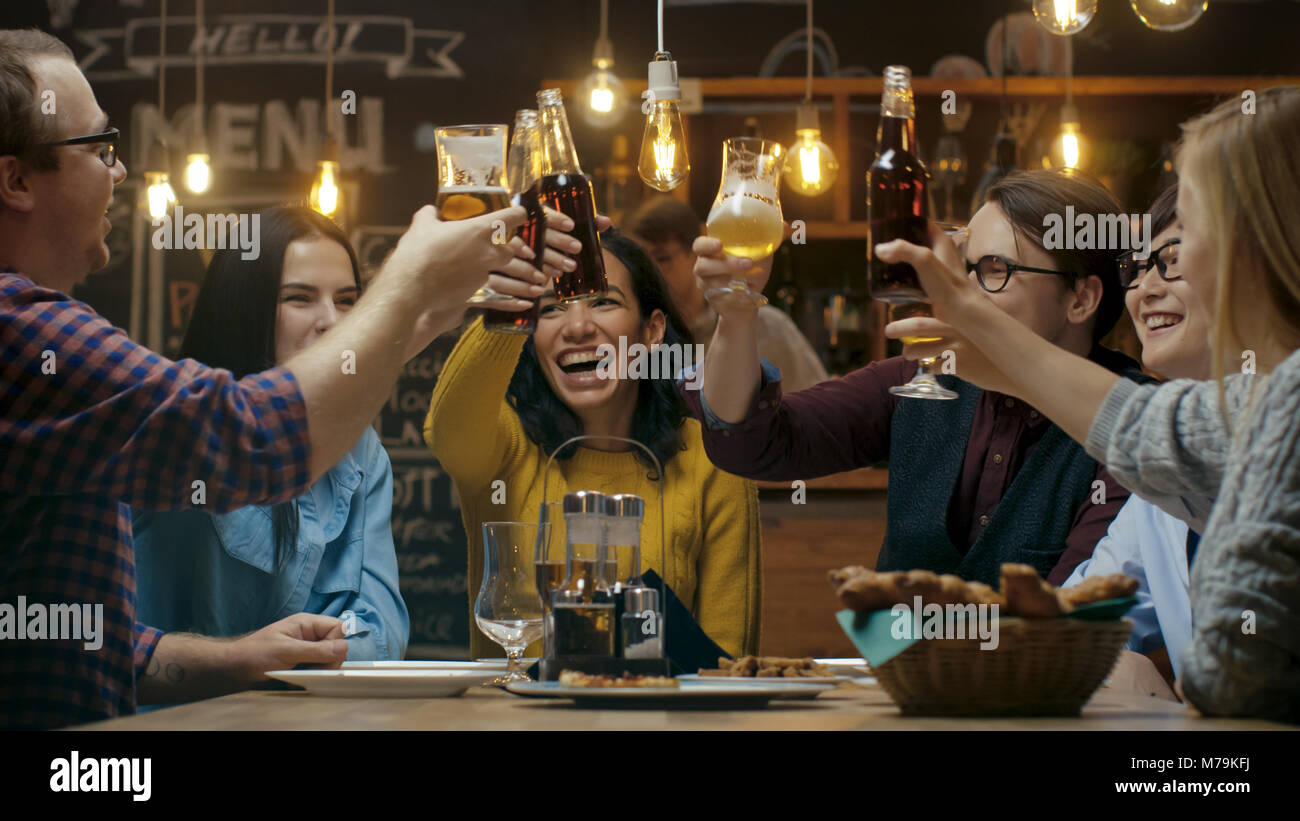 Diverse Group of Friends Celebrate with a Toast and Clink Raised ...