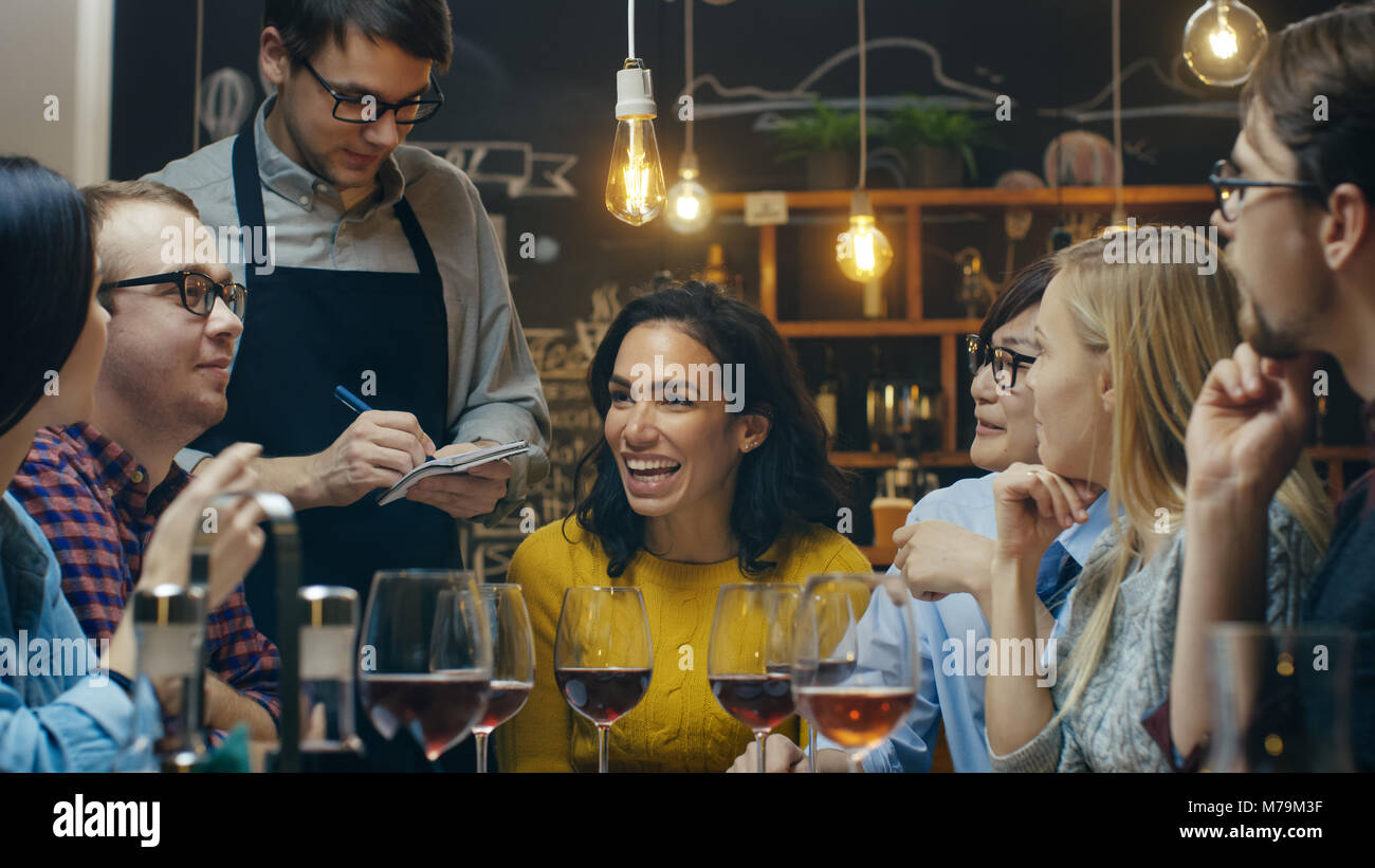 Group eating in restaurant stylish hi-res stock photography and images ...