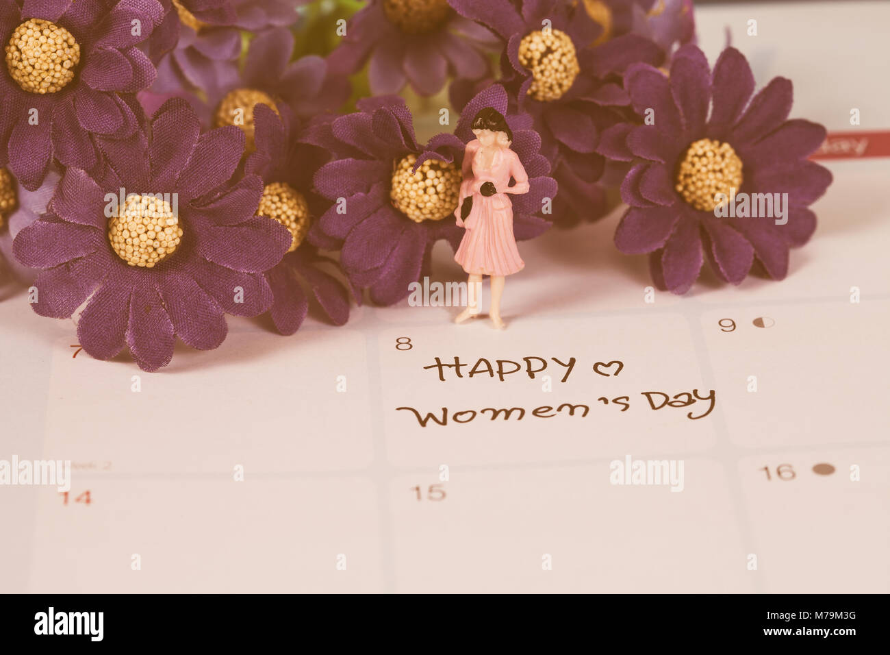 Happy women's day note on calendar book Stock Photo - Alamy