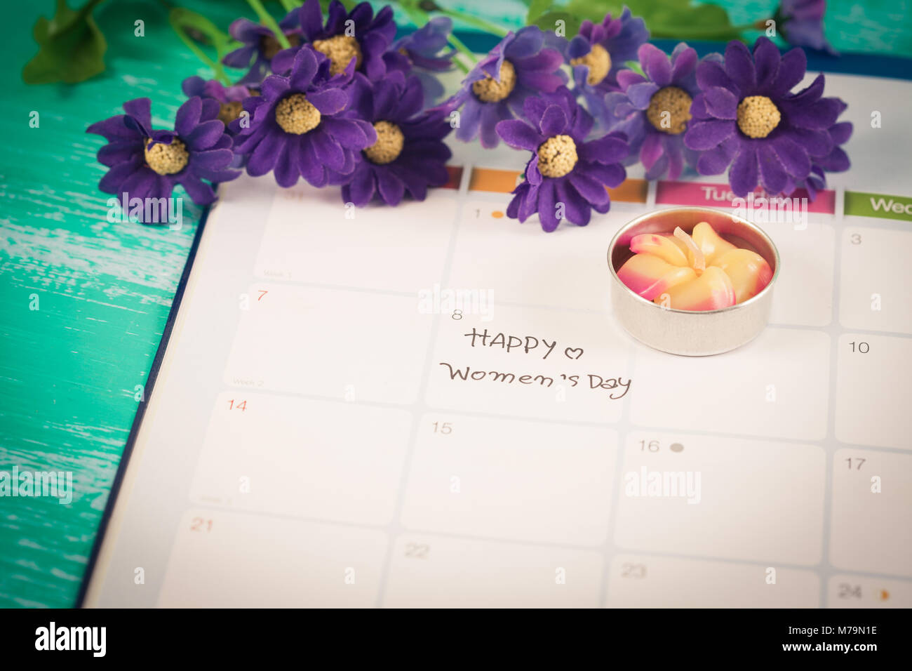 Happy women's day note on calendar book Stock Photo - Alamy