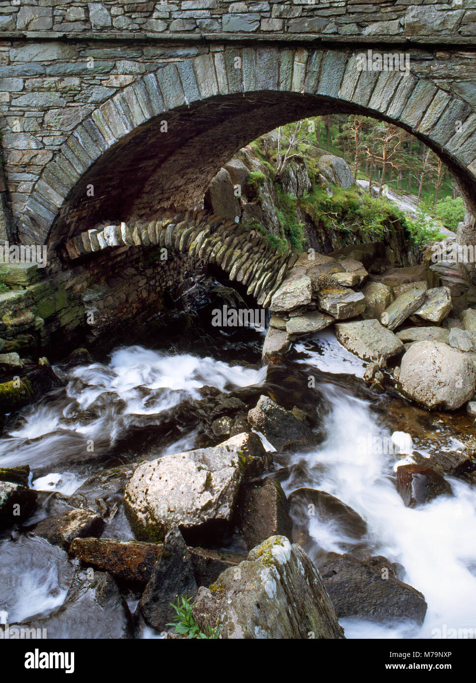 Pont Pen y Benglog. Arch of tiny medieval packhorse bridge preserved ...