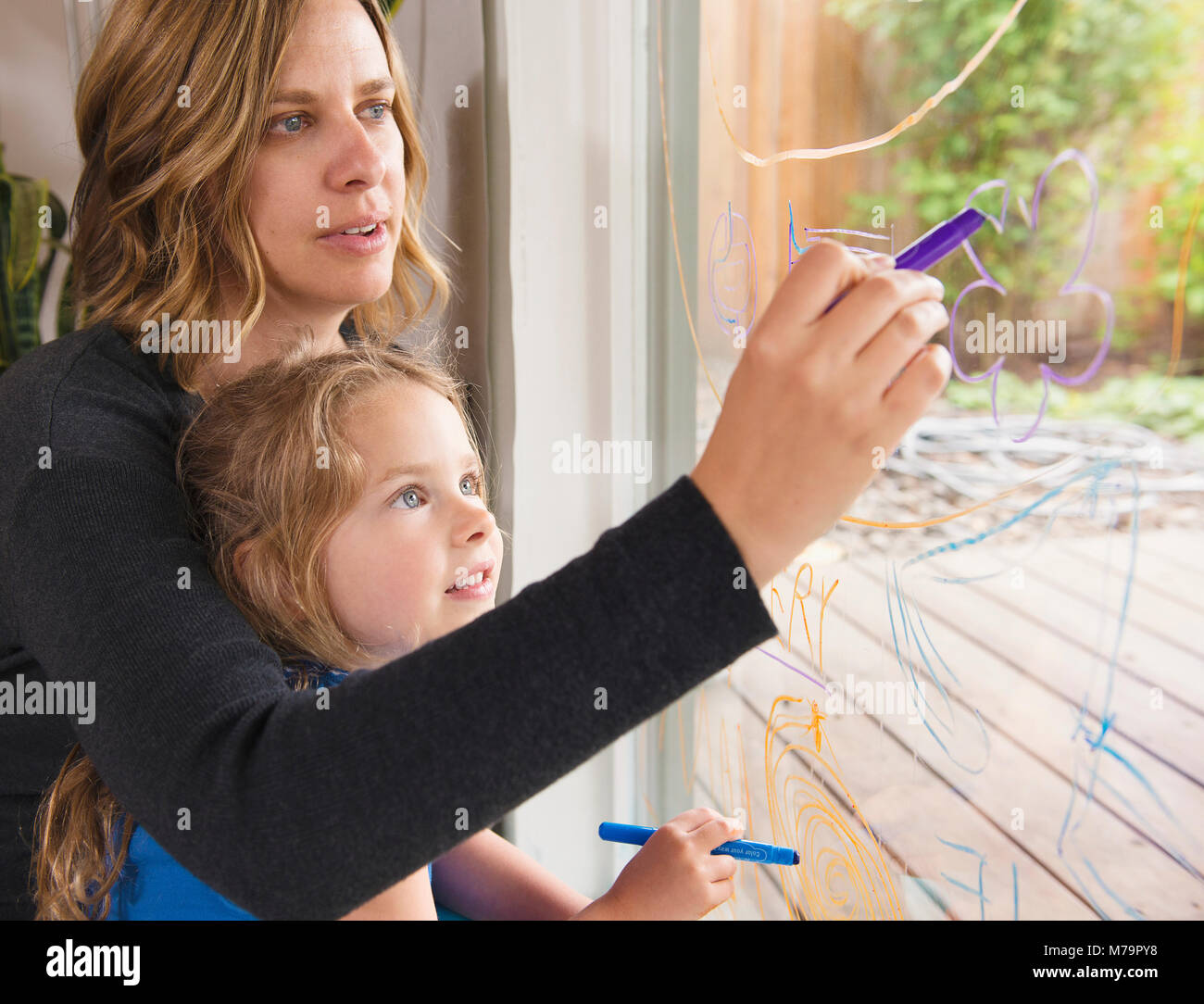 Children playing out the window hi-res stock photography and images - Alamy