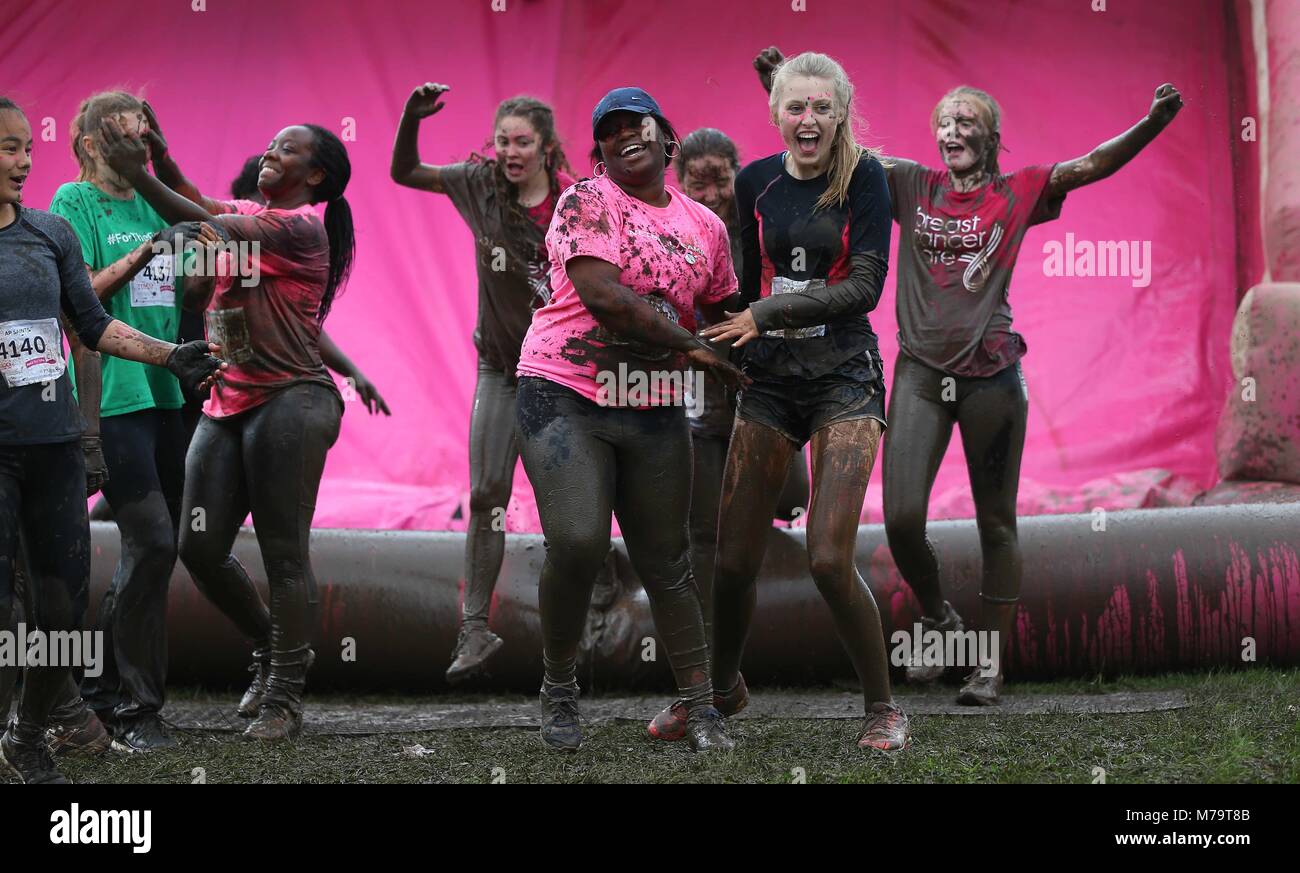Women take part in the 'Pretty Muddy' charity run for Cancer Research ...