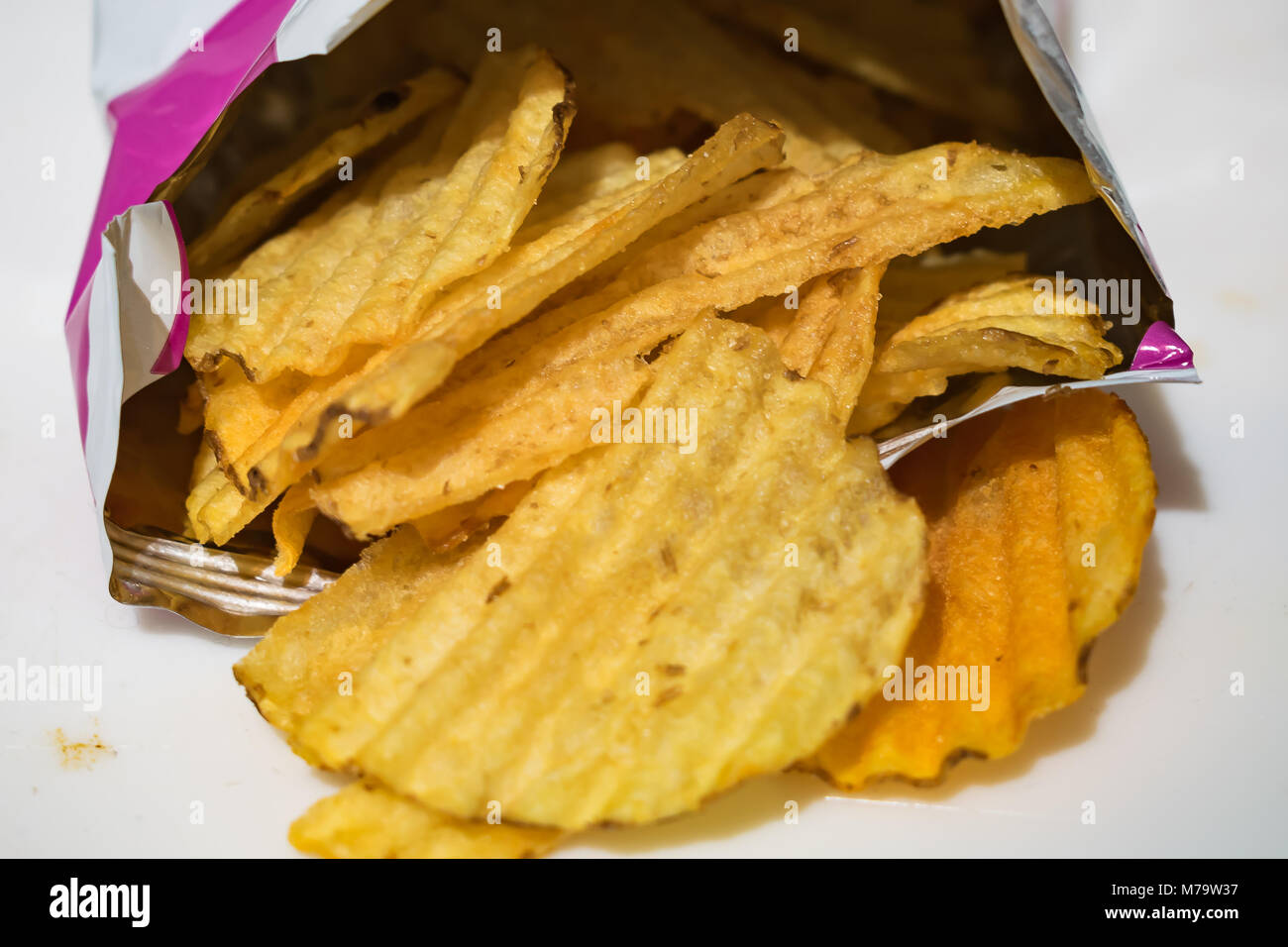 crinkle cut crisp's Stock Photo - Alamy