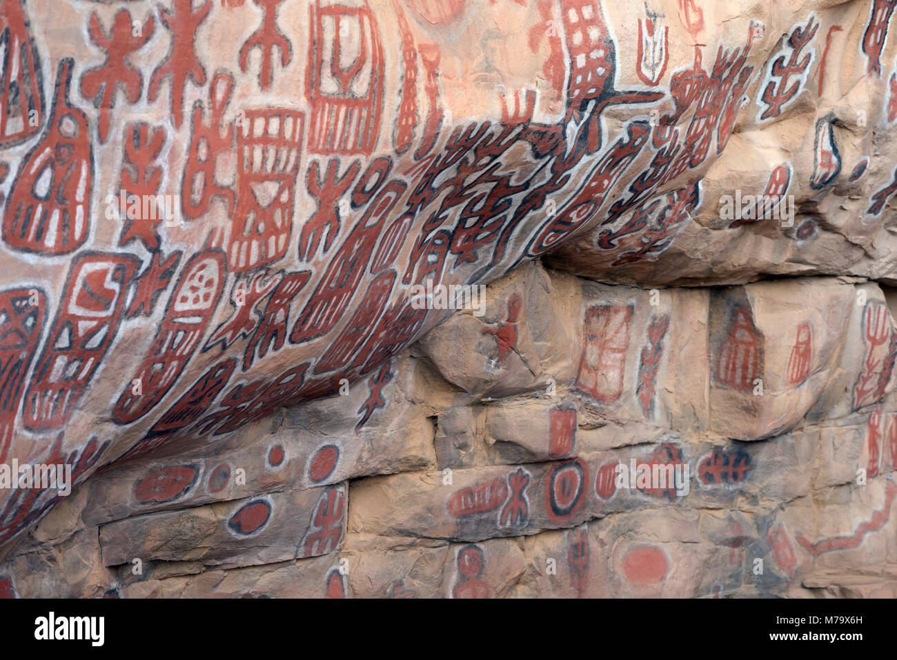 Tribal art in the form of cave painting at a traditional circumcision ...